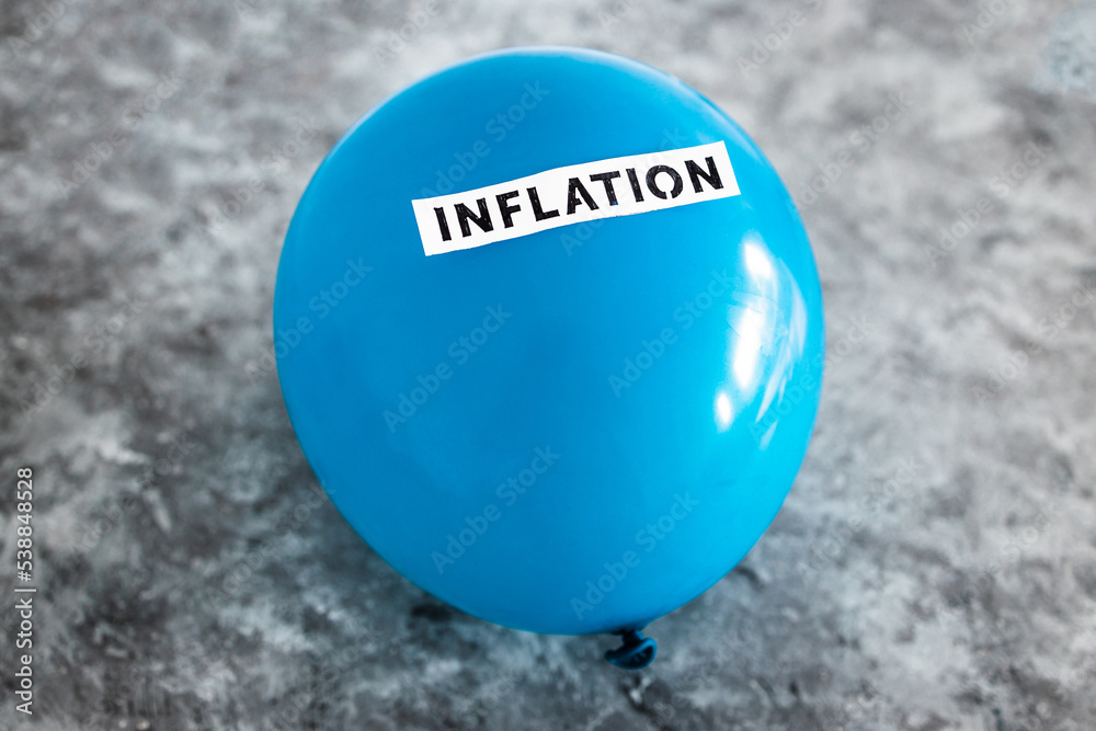 inflation text on top of big inflated balloon, the post-pandemic ...