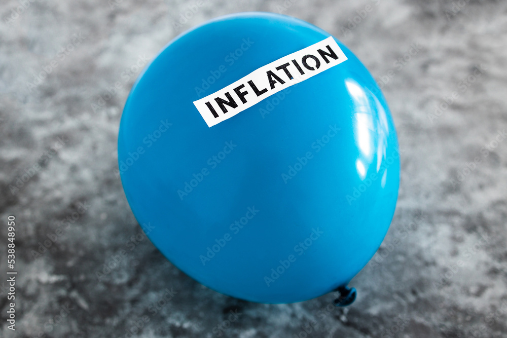 inflation text on top of big inflated balloon, the post-pandemic ...