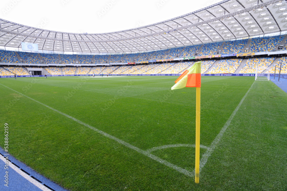 Corner flag on a football field of a stadium and empty stands Stock ...