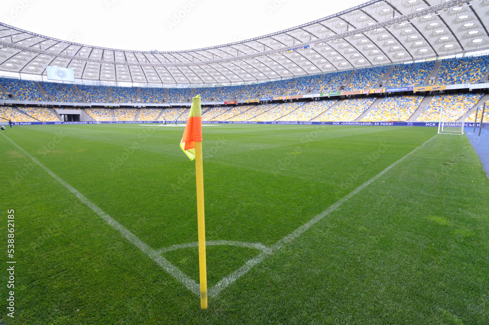 Corner flag on a football field of a stadium and empty stands Stock ...