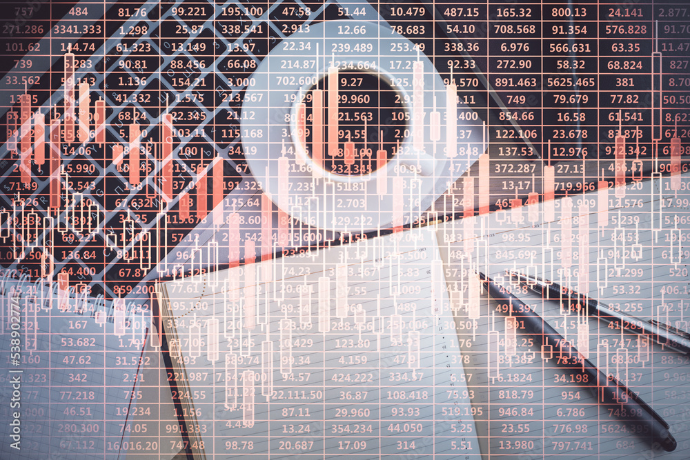 Stock market chart and top view computer on the table background ...