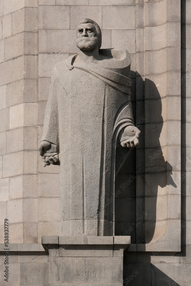 Frik (Armenian medieval poet) statue in front of Matenadaran on sunny ...