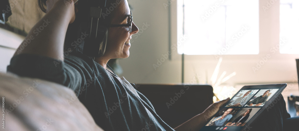 Pretty woman has video call conference with her remote team. Digital ...