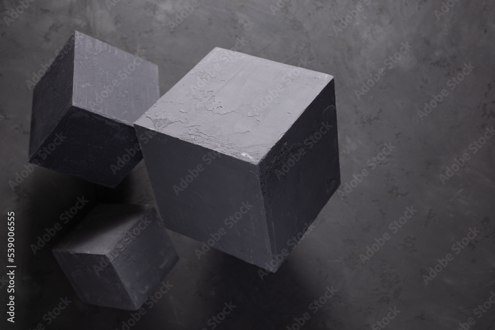 Concrete cube shape on floor background texture. Cement block as ...
