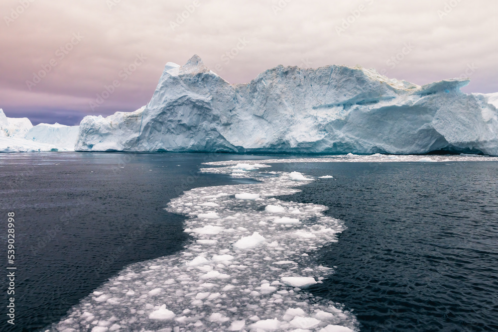 Giant iceberg floating in Ilulissat Icefjord in Greenland Stock Photo | Adobe Stock