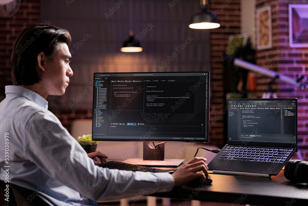 Asian Developer Using Binary Code To Script Security System Programming Firewall Encryption
