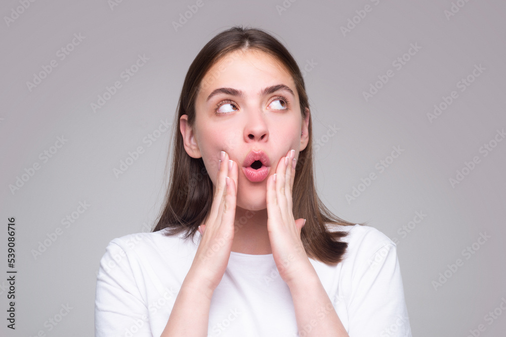 Shocked face of surprised young woman. Funny female shocked face ...