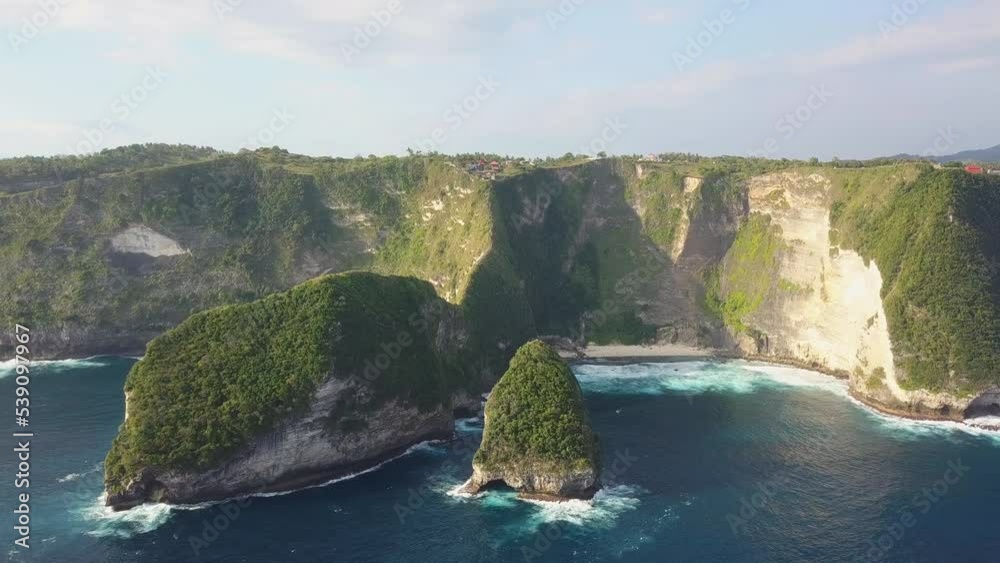 Dramatic aerial drone footage of the famous Kelingking beach, aka T Rex ...