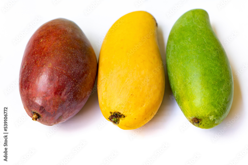 Various species of mango with isolated white background. mango fruit is ...