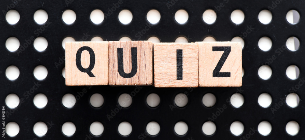 word quiz made up of wooden letters Stock Photo | Adobe Stock