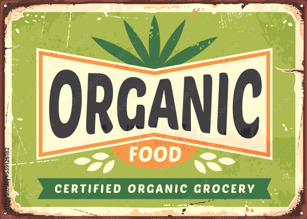 Organic food store sign with green leaves on a retro background ...
