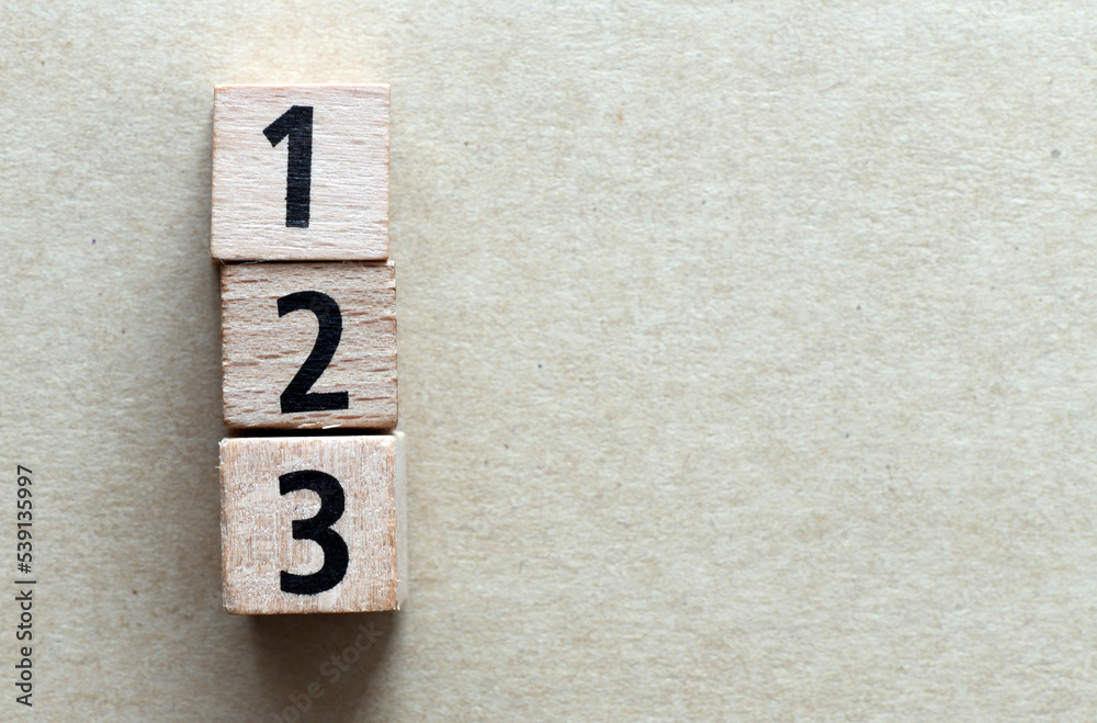 Order of priorities. 1,2,3 numbers arranged from wooden letters. Stock ...