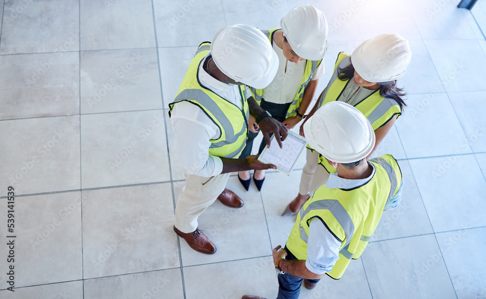 Architecture, engineering and design team use tablet for planning ...