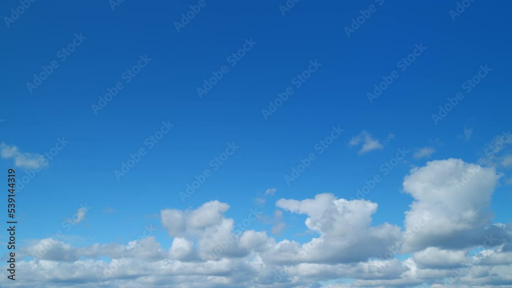 Beautiful cirrus and cumulus on different layers clouds. Daytime sky ...