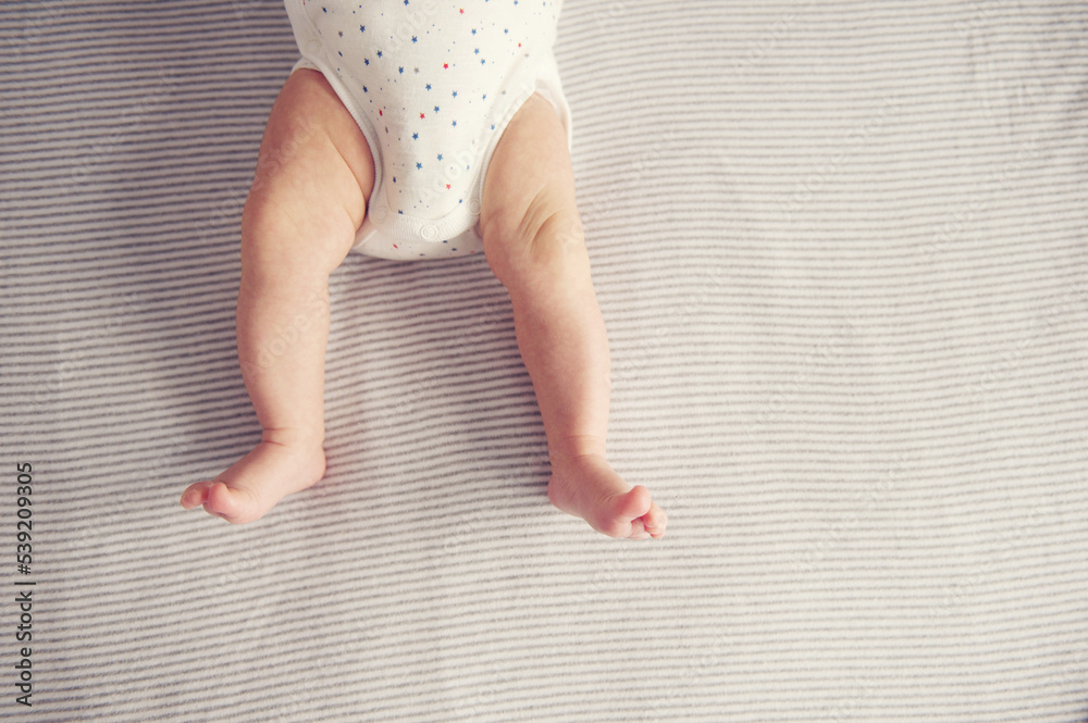 Stretched out baby legs from above Stock Photo | Adobe Stock