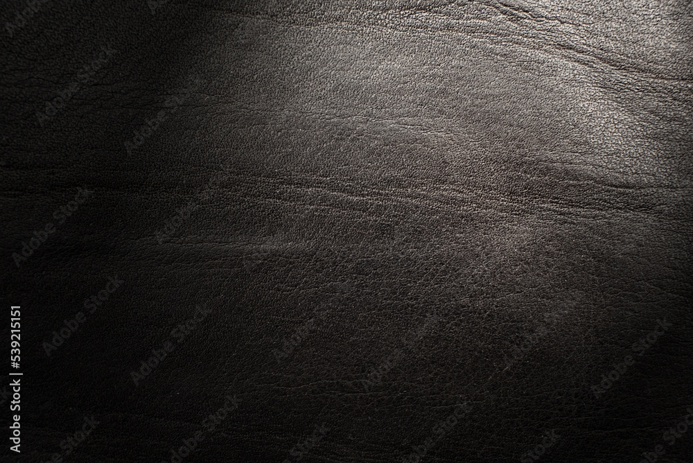 Black leather texture. Abstract background of dark leather with small ...