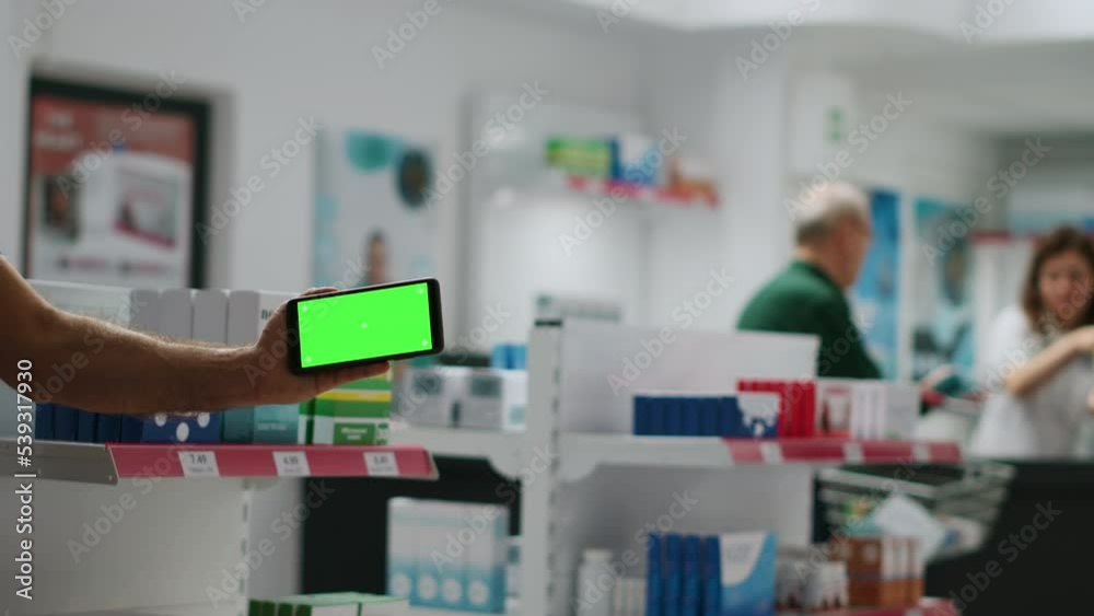 Smartphone showing horizontal greenscreen template in pharmaceutical ...
