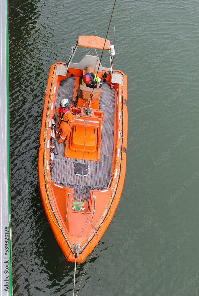 Top down view, Fast Rescue Boat (FRC) lowered and prepared for ...