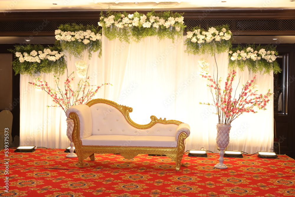 white theme stage decoration with white lace cloth in the background ...