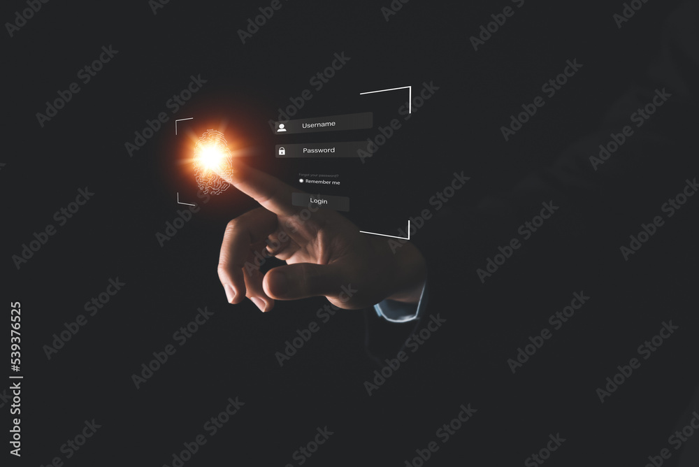 A businessman's hand scans fingerprints through a virtual screen ...