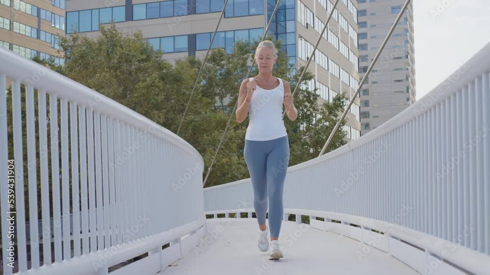 Cinematic footage of a beautiful senior fashion influencer with silver ...