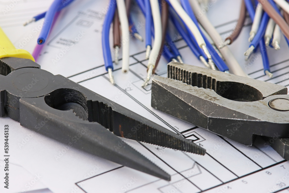 Tools for electrical installation and copper wires in colored ...