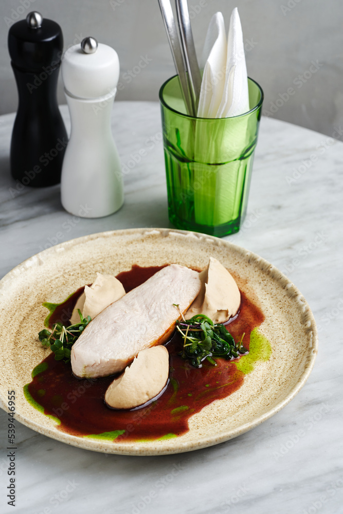 Roasted turkey fillet with potato mash, microgreens and green oil on ...