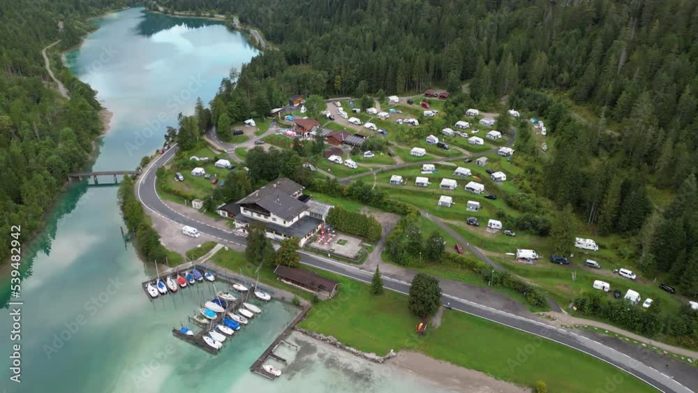 Camping Seespitze campsite Plansee Austria drone aerial view pull back ...