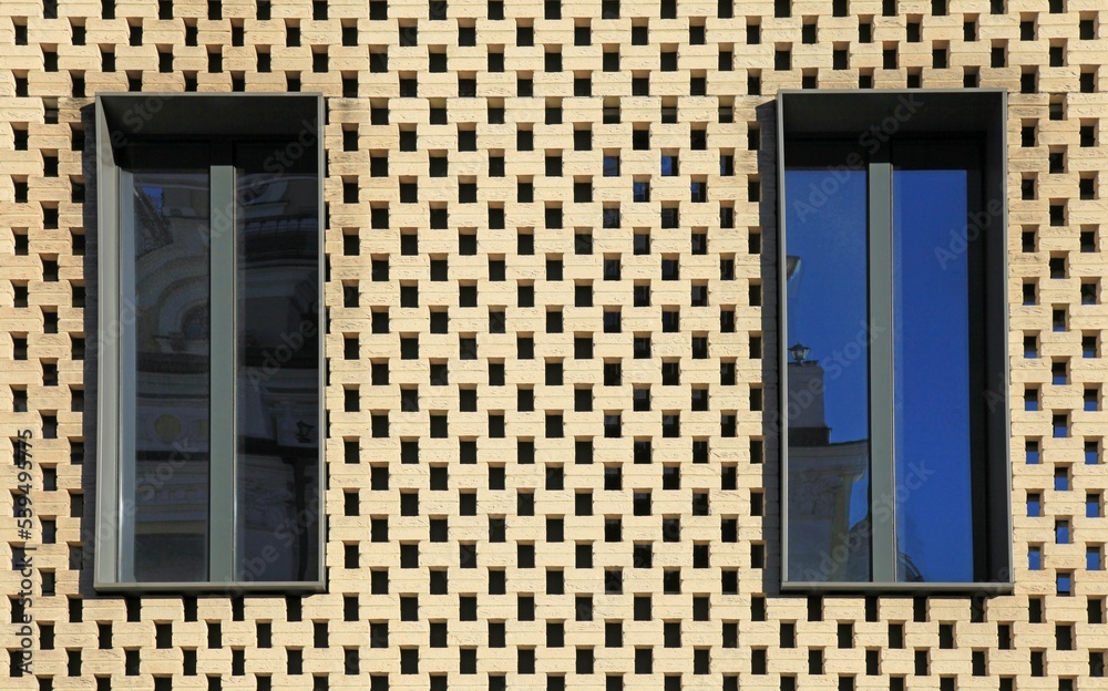 Windows of office building. Hinged and ventilated facade. Honeycomb and ...