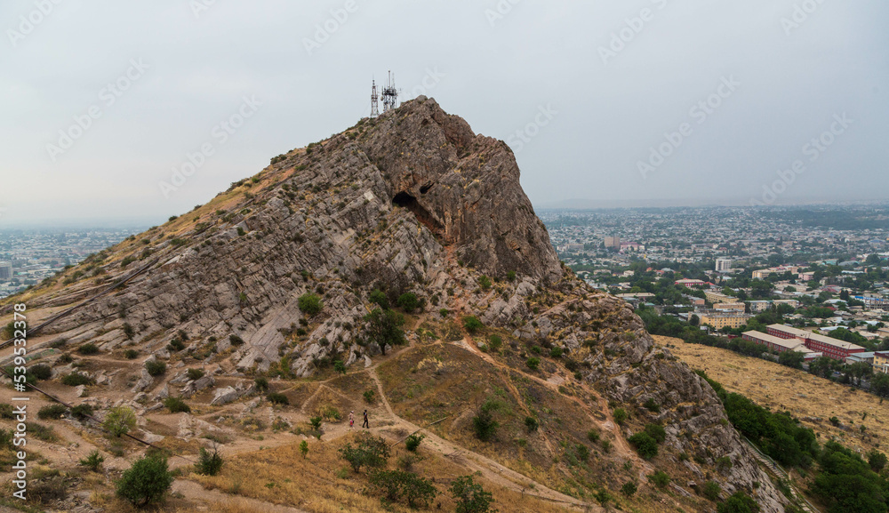 Panorama of Osh town from Sulaiman-Too mountain. The rock Suleiman-too ...