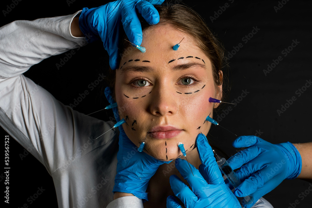 young beautiful girl with deep eyes looking into the camera. needles ...