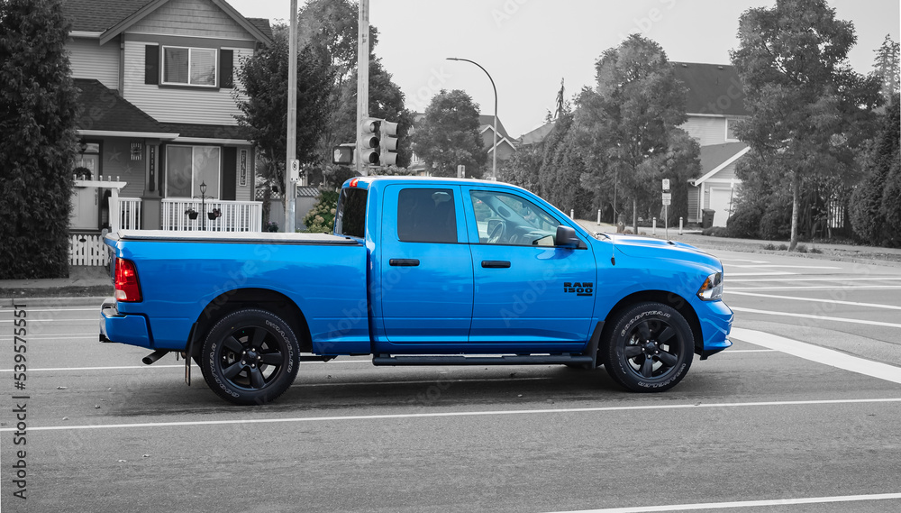 Dodge RAM 1500 on the road. Blue pickup truck Dodge Ram 1500 at the ...