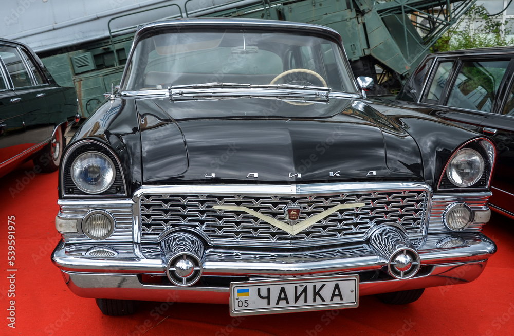 Old car land festival. GAZ 13 Chaika Soviet executive car of the ...