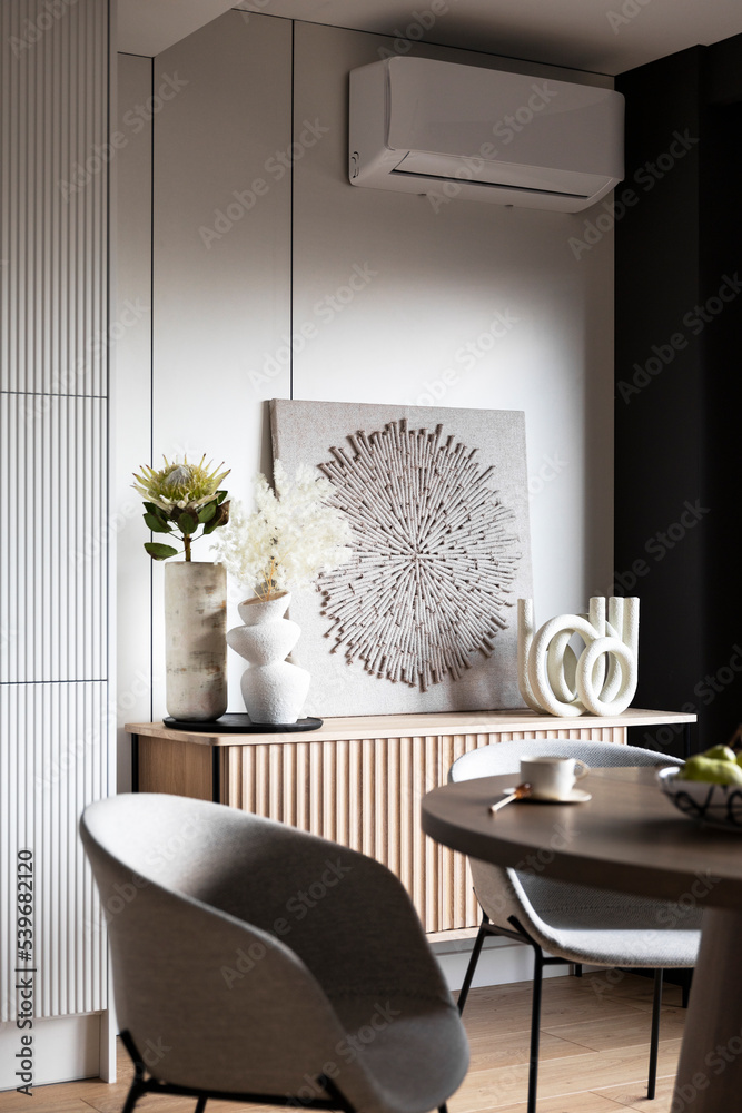 Interior design of aesthetic and elegant room with stylish commode ...