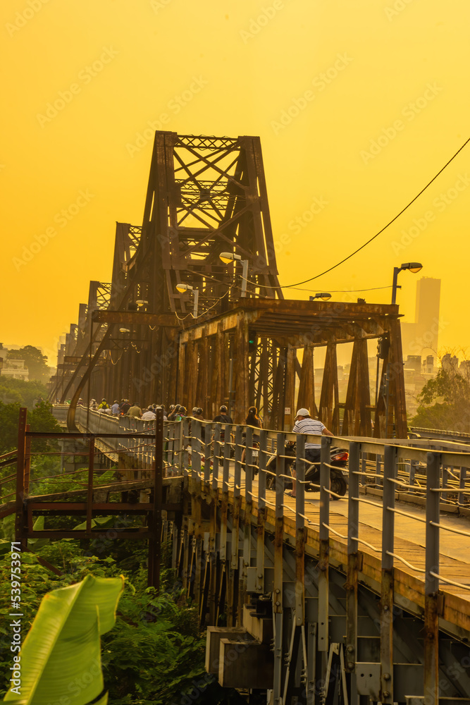 View of Long Bien bridge over Hong (Red) river. Though the bridge was ...