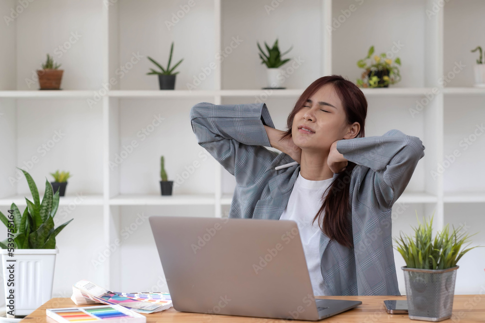 Office syndrome concept, Millennial Asian businesswoman having a ...