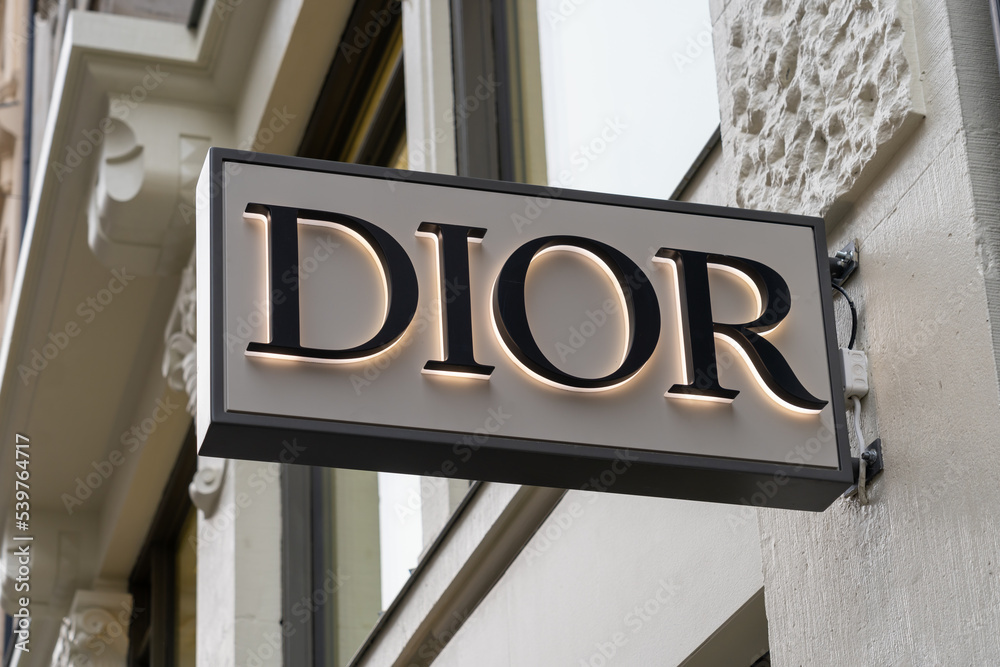 Oslo, Norway - October 15, 2022: Close up of Dior store projecting sign ...