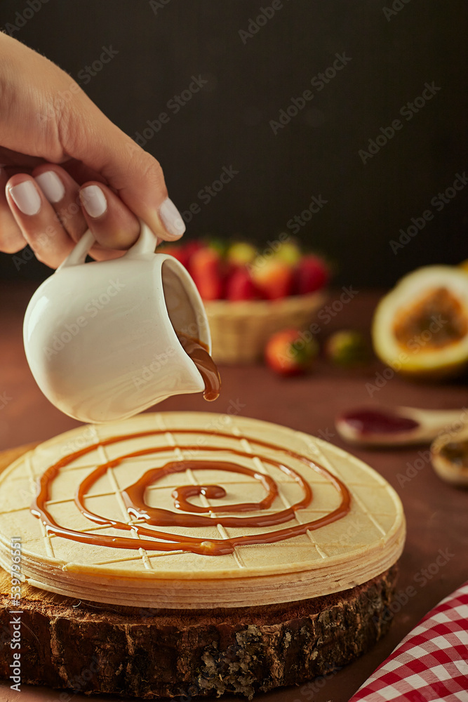 vertical view of oblea, traditional Colombian dessert, wafer with ...