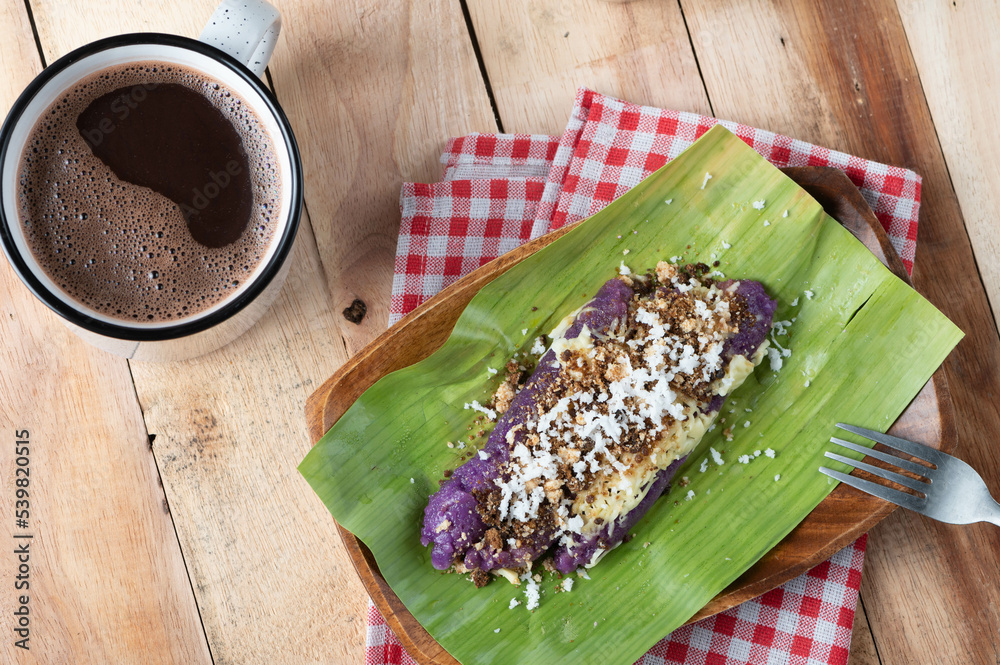 Foto de Puto bumbóng is a Filipino purple rice cake steamed in bamboo ...