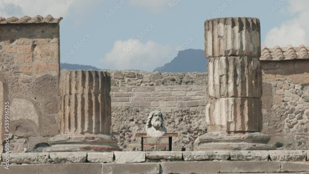 Bust of Jupiter Between The Ancient Pillars At The Temple of Jupiter In ...