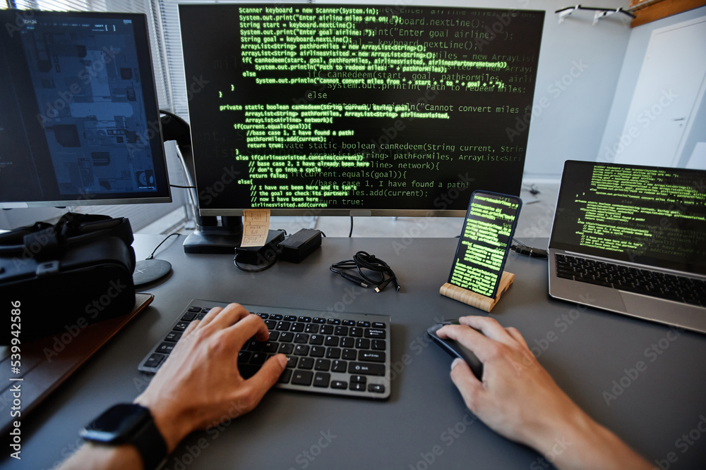 POV shot of computer programmer working with green code lines on ...