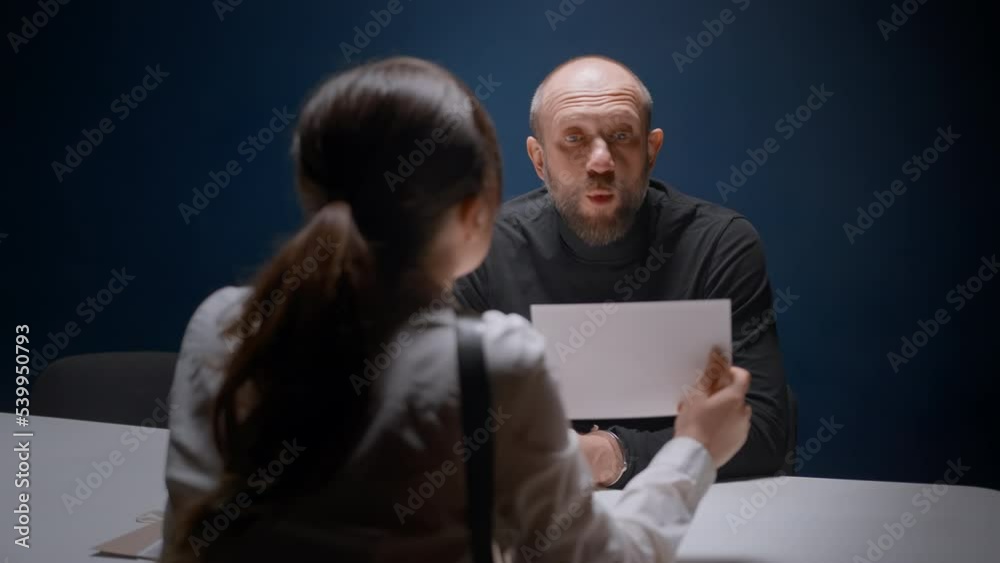 Interrogation, suspect in handcuffs screams and emotionally denies FBI ...