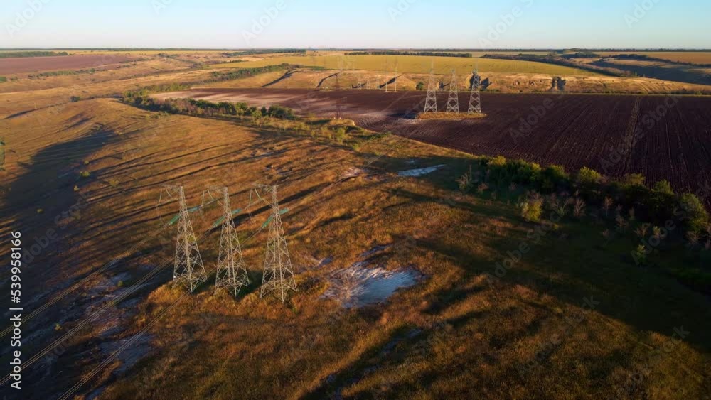 Electricity: High voltage power lines, aerial wide, open or close shot ...