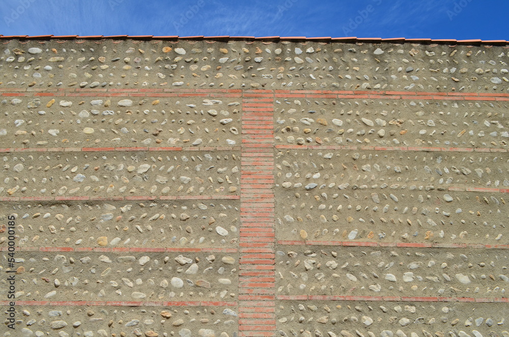 Mur construit en galets et briques. (France) Stock Photo | Adobe Stock