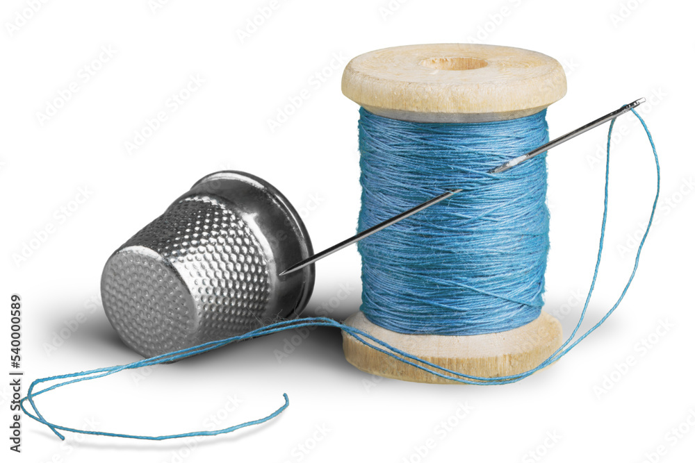 Spool of Thread with Needle and Thimble Stock Photo | Adobe Stock