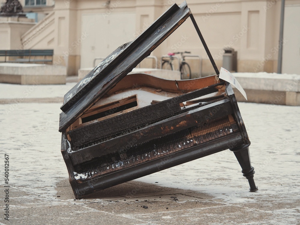 Broken piano standing on only one leg captured outdoors Stock Photo ...