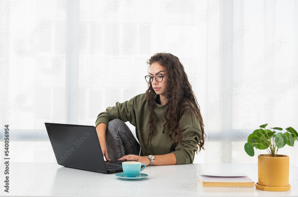 Young schoolgirl or college student teenage reading examination ...