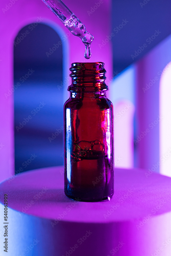 amber glass dropper bottle with black cap in neon vibrant blue and ...