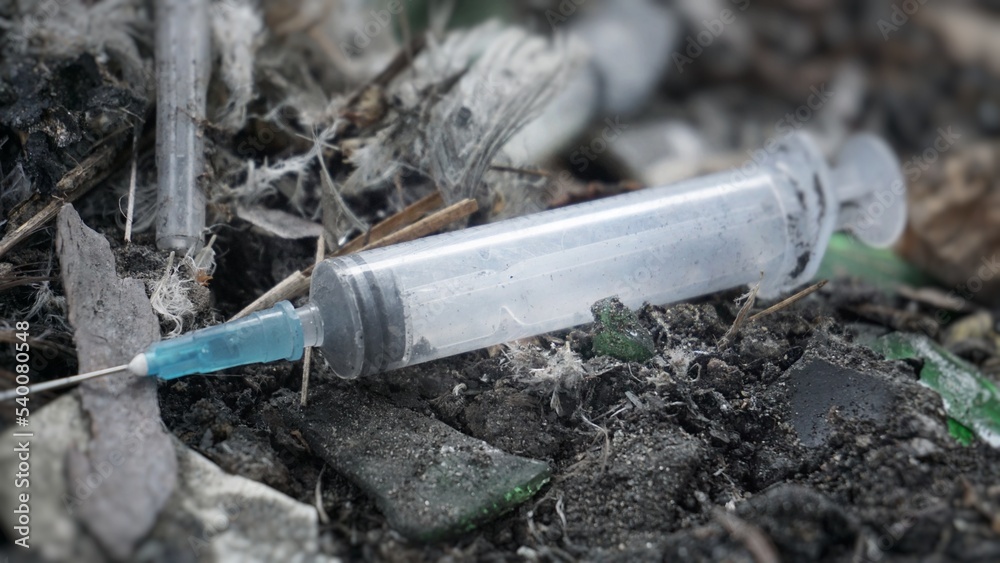 Used syringes, discarded, Syringes lie in an abandoned house, at a ...