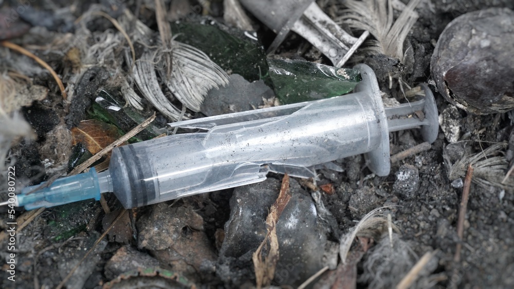 Used syringes, discarded, Syringes lie in an abandoned house, at a ...